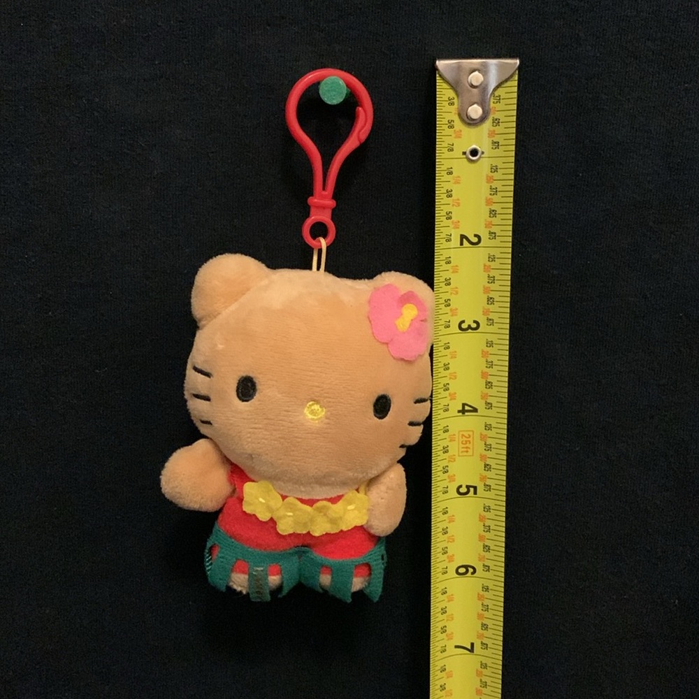 Hello Kitty Hawaii Exclusive Hula Grass Skirt Bag Clip - Gem